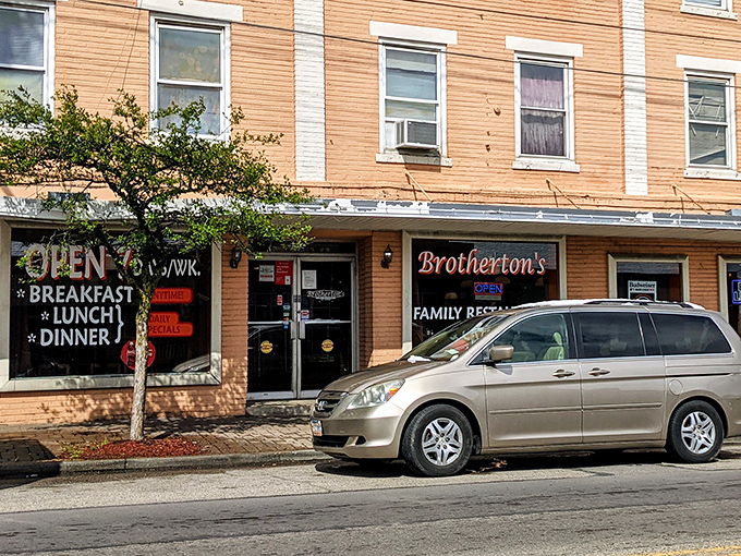 The neon glow of Brotherton's sign isn't just illumination—it's a beacon calling you home to Cincinnati comfort food paradise.