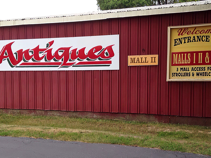 The iconic red barn exterior of Volo Antique Malls stands as a beacon to treasure hunters, promising adventures in nostalgia just beyond those doors.