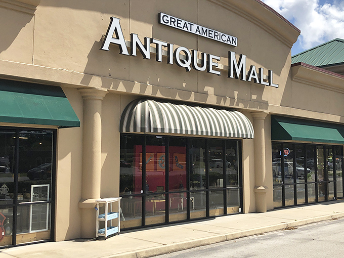 The storefront beckons with its classic striped awning &ndash; like a time portal disguised as a strip mall tenant. Treasure awaits!