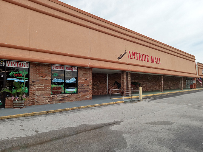 The unassuming exterior of Wildwood Antique Mall &ndash; like finding a treasure chest disguised as a shoebox. Adventure awaits behind those brick walls!