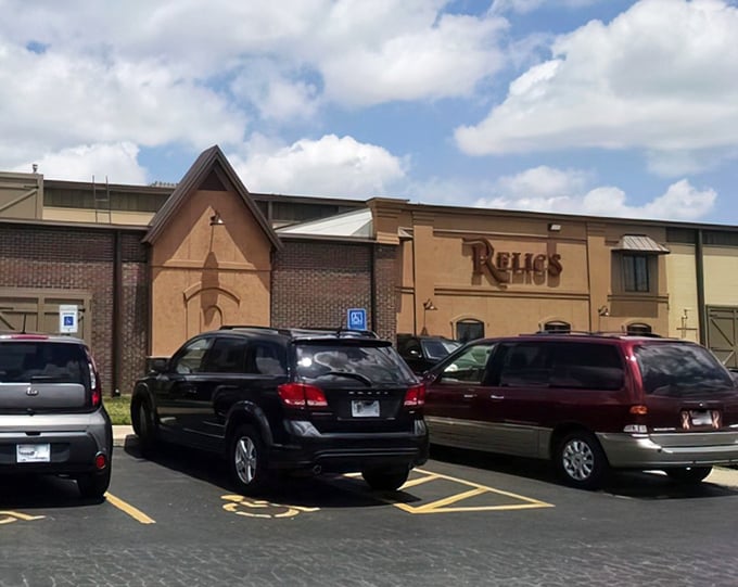 The unassuming exterior of Relics Antique Mall hides a universe of treasures within, like a TARDIS disguised as a strip mall storefront.