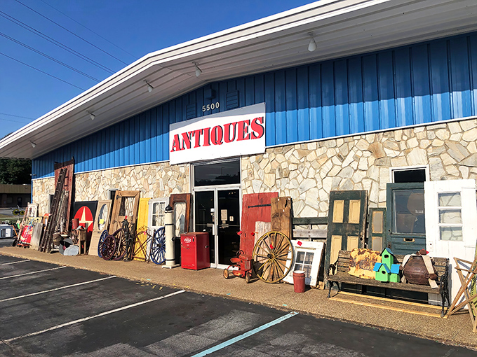 The blue facade with its bold "ANTIQUES" sign isn't just a storefront&mdash;it's a portal to decades past waiting to be explored.