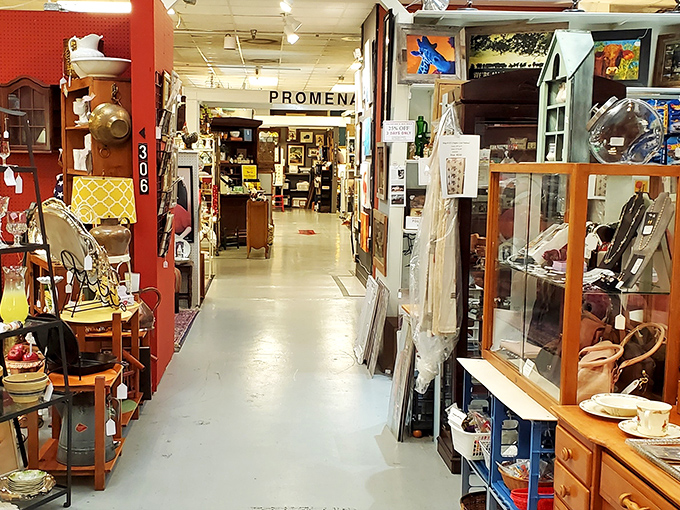 Wide aisles invite exploration through this treasure hunter's paradise, where vintage clothing and antique furniture create a time-traveler's dream landscape.