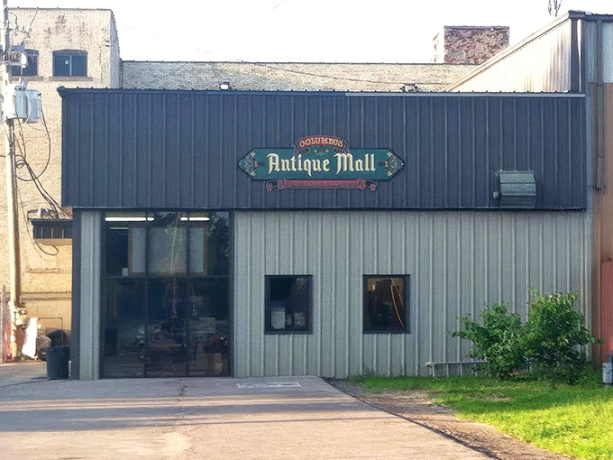 The unassuming exterior of Columbus Antique Mall proves that treasure hunting begins with buildings that keep their secrets well-hidden behind modest facades.