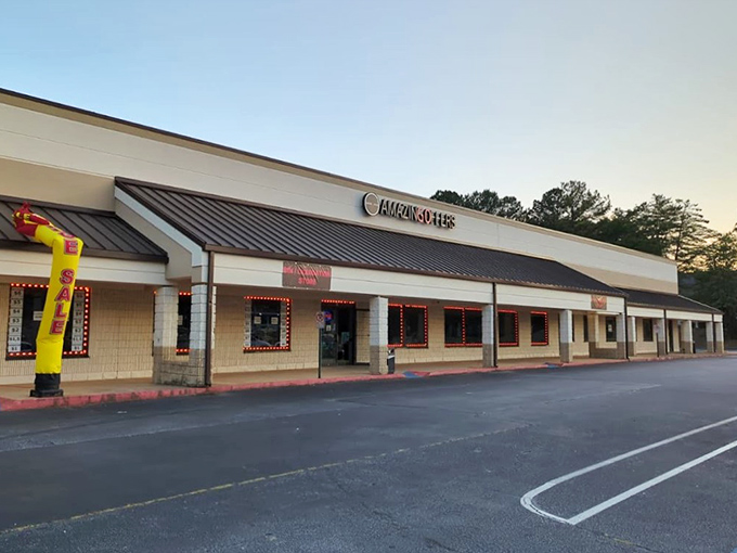 The unassuming storefront of BinCredible Deals in Stone Mountain hides a treasure trove within, like a pirate's chest disguised as a strip mall.
