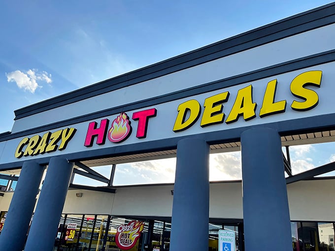 The bright yellow and red signage of Crazy Hot Deals beckons like a retail lighthouse, promising treasures within that won't burn a hole in your wallet.