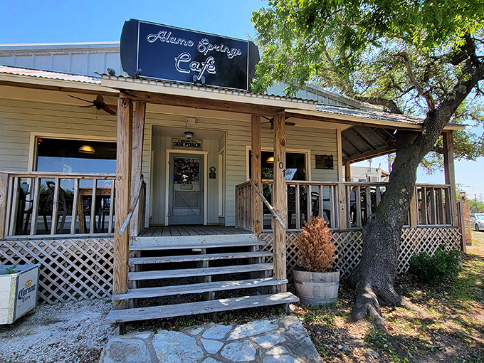 The humble exterior of Alamo Springs Caf&eacute; belies the culinary treasures within. Texas Hill Country magic awaits on this rustic patio.