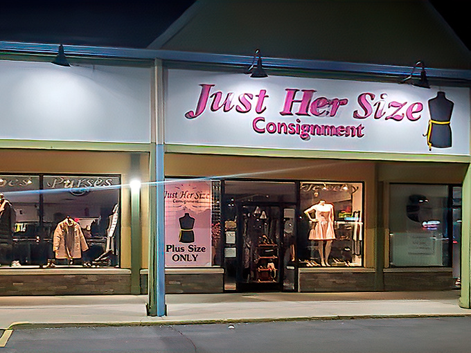 The pink neon sign of Just Her Size Consignment glows like a beacon for bargain hunters in Fairfield, promising fashion treasures waiting to be discovered.
