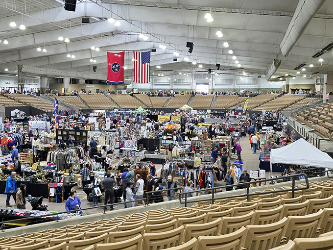 The treasure hunt begins! Red canopies shelter an eclectic array of vintage finds, from wooden windows to holiday decorations, all waiting for their forever homes.