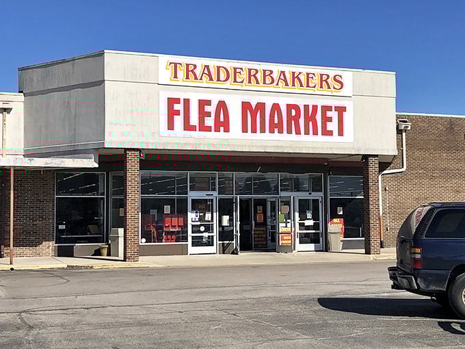 The unassuming exterior of Traderbakers beckons with its bold red lettering, promising treasures within like a carnival barker inviting you to step right up.