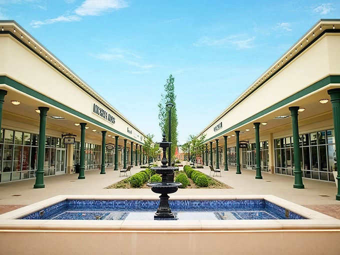 The grand entrance to Tanger Outlets Savannah welcomes shoppers with its distinctive signage, promising retail adventures that'll make your credit card both weep and rejoice.