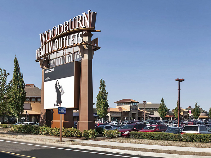 The Northwest-inspired architecture of Woodburn Premium Outlets welcomes shoppers with its distinctive peaked roofs and stone facades&mdash;retail therapy with a touch of mountain lodge aesthetic.
