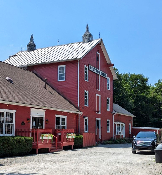 The iconic red mill perched above cascading waterfalls isn't just Instagram bait&mdash;it's a 200-year-old testament to when breakfast came with a side of history.