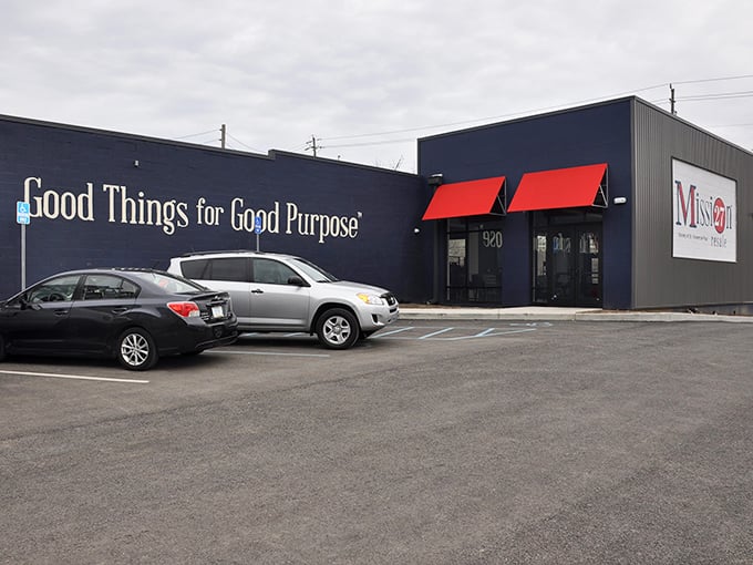 The striking navy-blue exterior with its bold "Good Things for Good Purpose" motto isn't just clever marketing—it's the honest-to-goodness mission of this Indy gem.