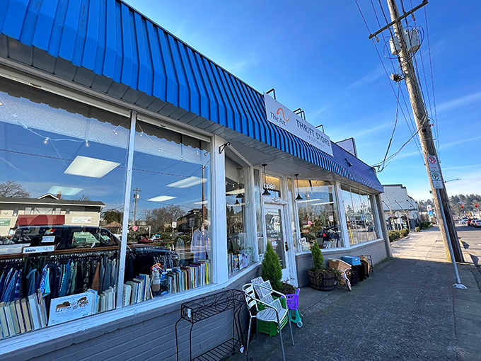 The welcoming storefront of The Arc Thrift Store beckons with its glowing neon sign&mdash;like a lighthouse guiding bargain hunters to treasure-filled shores.