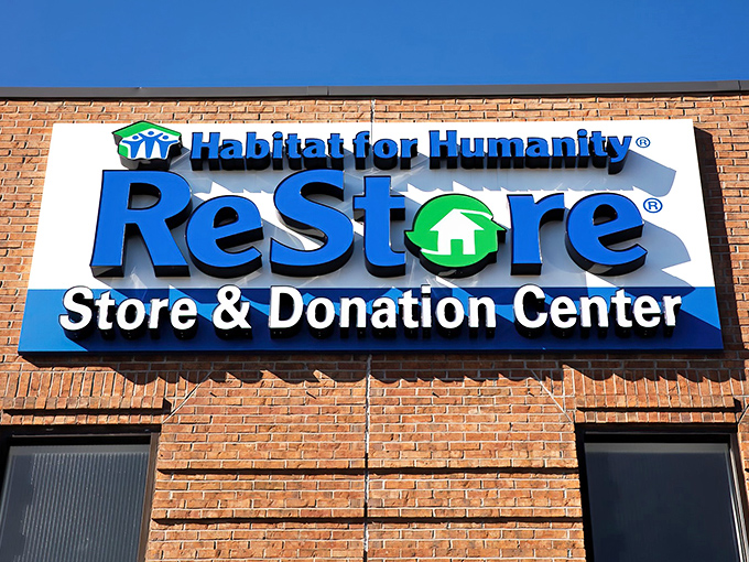 The blue and green sign beckons like a lighthouse to bargain hunters. This isn't just shopping&mdash;it's treasure hunting with a purpose.