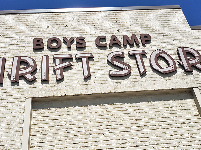 The rustic wooden entrance portico of Boys Camp Thrift Store promises treasure hunting adventures that won't break the bank.
