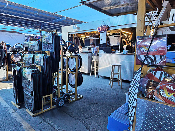 Vendors transform ordinary spaces into retail wonderlands, where steering wheels and luggage compete for your attention and wallet.