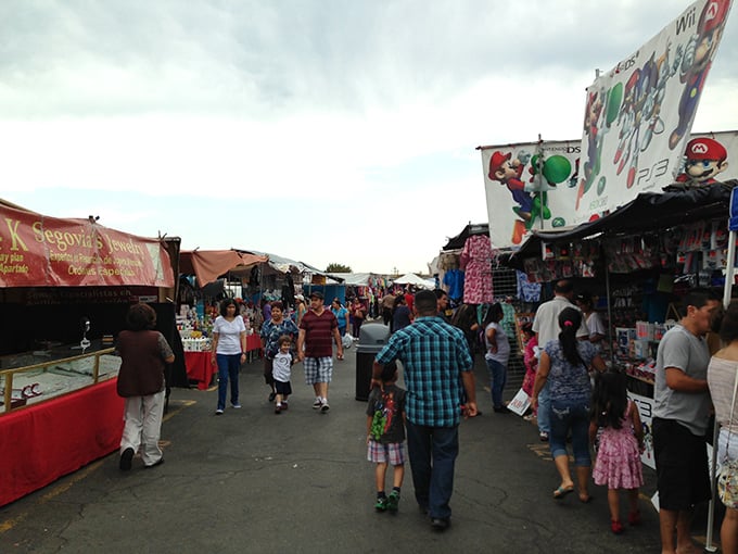 Families stroll through the bustling aisles of Paramount Swap Meet, where every turn promises a new discovery and potential bargain.