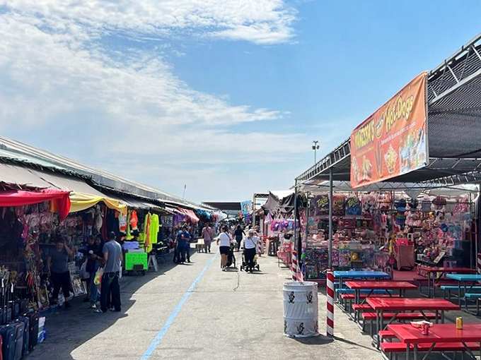 The bustling main corridor of the San Jose Flea Market stretches like a retail Milky Way, with colorful merchandise galaxies on either side beckoning explorers.