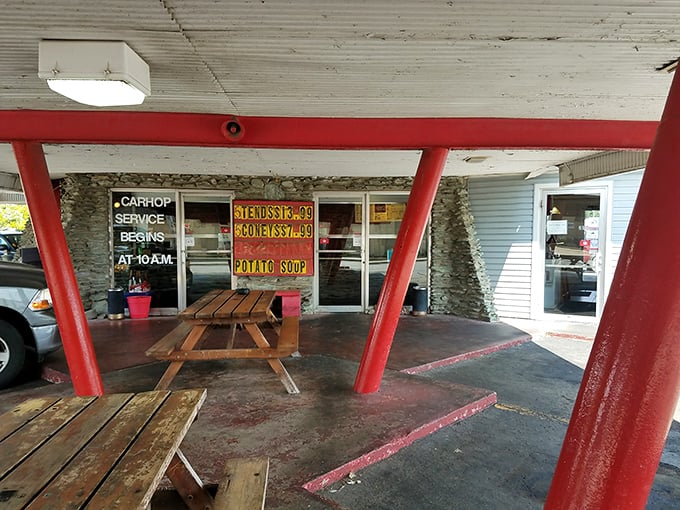 The iconic red-pillared carport at Ray's hasn't changed in decades – proof that when something works perfectly, you don't mess with it.