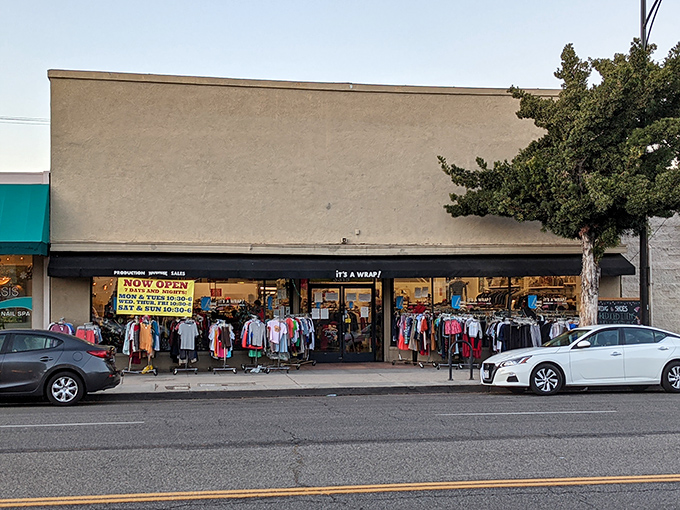 The unassuming storefront belies the cinematic treasures within. Even the sidewalk racks hint at the Hollywood history awaiting inside.