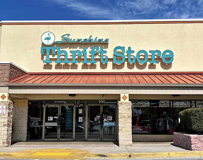 The turquoise sign beckons like a siren call to bargain hunters. Sunshine Thrift's flamingo logo perfectly captures Florida's thrifty paradise vibe.