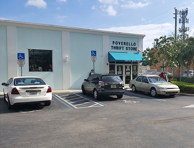 The unassuming blue exterior hides a treasure trove within. Like finding a secret passage in your favorite childhood book, this thrift store adventure begins here.