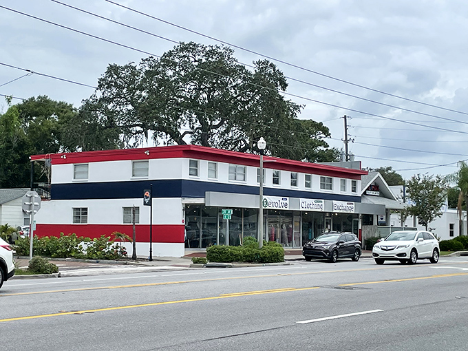 The red, white, and blue exterior of Revolve stands like a patriotic fashion embassy on St. Petersburg's streets, promising treasures within.