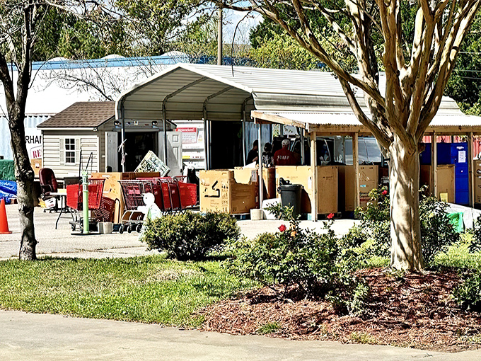 The donation drop-off area welcomes generous souls with cheerful yellow landscaping. Your castoffs become someone else's treasure hunt starting right here.