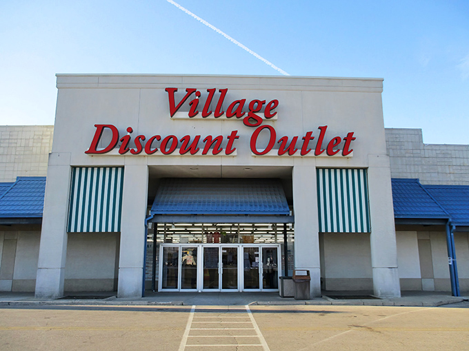 The iconic red signage of Village Discount Outlet beckons like a lighthouse for bargain hunters navigating the sea of retail options in Dayton.