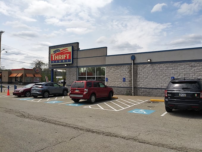 The unassuming exterior of Red White & Blue Thrift Store&mdash;where budget-friendly treasures await behind a facade that keeps Pittsburgh's best bargain secret hiding in plain sight.