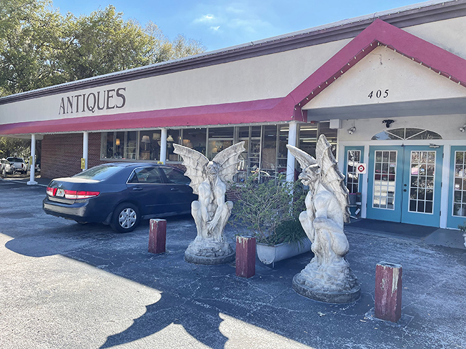Guarded by stone sentinels, Village Antique Mall's unassuming exterior gives little hint of the time-traveling adventure waiting inside. Welcome to treasure hunter paradise!