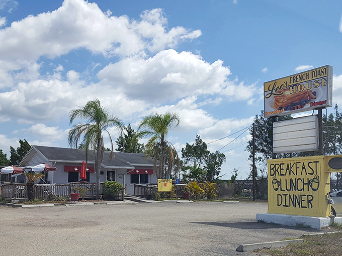 The cheerful yellow exterior of Leo's French Toast House welcomes hungry travelers with its bright facade and accessible entrance. Florida sunshine seems to radiate from the building itself.
