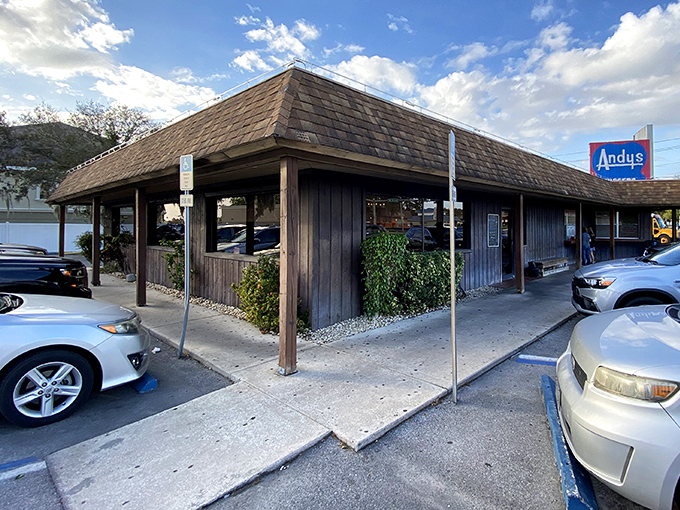 The iconic Andy's Igloo sign stands proud against the Florida sky, a beacon of frozen delights that's been calling to sweet-toothed travelers for generations.