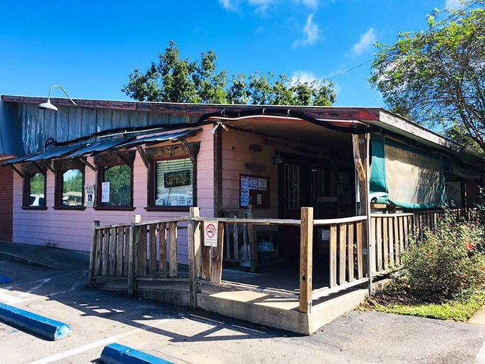 The unassuming pink exterior of Mel's Country Cafe proves once again that culinary treasures often hide in plain sight. No fancy facade needed when the food speaks volumes.