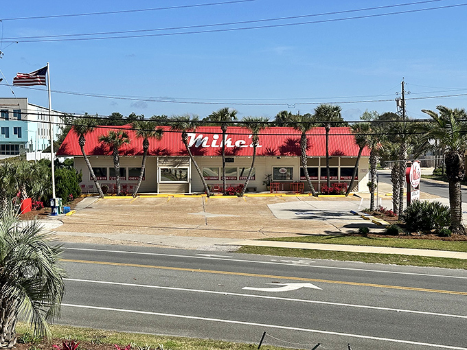 Mike's distinctive red roof beckons seafood lovers like a lighthouse for the hungry. This unassuming Panama City Beach landmark promises treasures within.