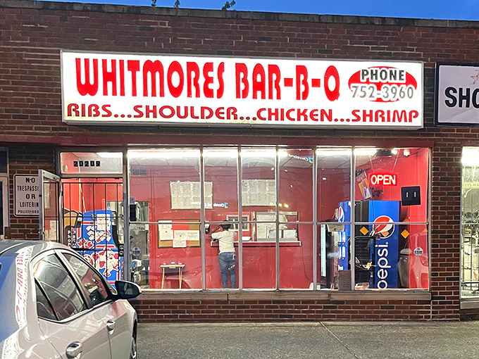 That red brick facade might look humble, but inside lies barbecue magic that'll change your life forever.