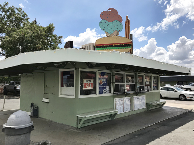 That mint-green time capsule with the burger-and-ice-cream crown isn't trying to be retro&mdash;it just never stopped being itself. Pure California roadside magic.