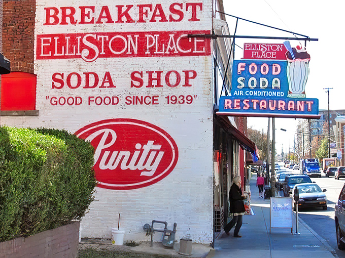 The iconic white brick building with its vintage "FOOD SODA" neon sign stands as Nashville's time machine to simpler days, complete with classic red and white awning.