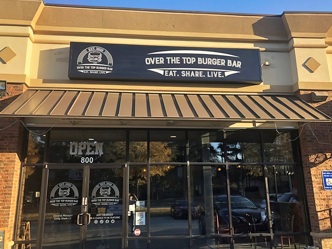 The unassuming storefront of Over The Top Burger Bar beckons like a siren song to burger enthusiasts. Behind those doors, culinary magic awaits the brave and hungry.