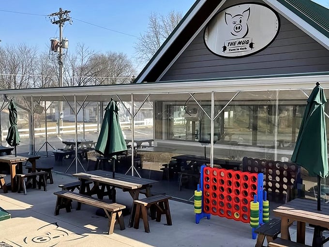 The Mug's charming exterior with its smiling pig logo promises what every food pilgrim seeks: honest food served with Midwestern hospitality.