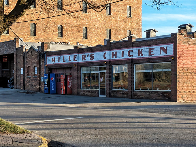 The iconic white and red-painted sign says it all &ndash; no fancy frills needed when your chicken speaks volumes through generations of crispy perfection.