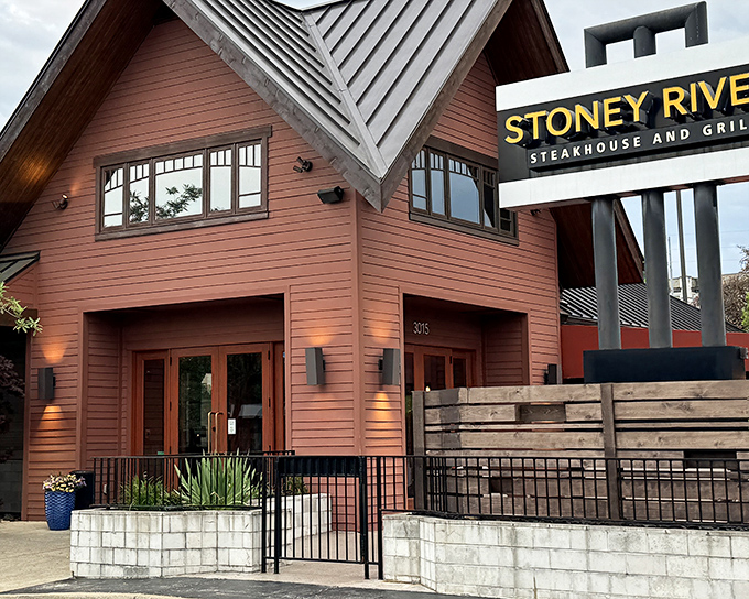 This rustic-chic exterior whispers "serious steakhouse" while the welcoming entrance practically shouts "come on in, friend!"