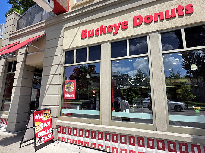The unassuming storefront with its cheerful red awnings has been a Columbus landmark for decades, beckoning hungry visitors with promises of sweet and savory delights.