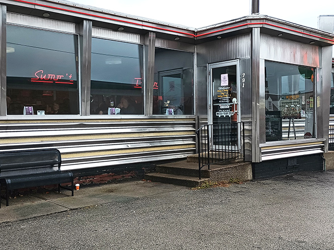 The gleaming stainless steel exterior of Summit Diner stands as a time capsule on wheels, promising comfort food and conversations that matter.