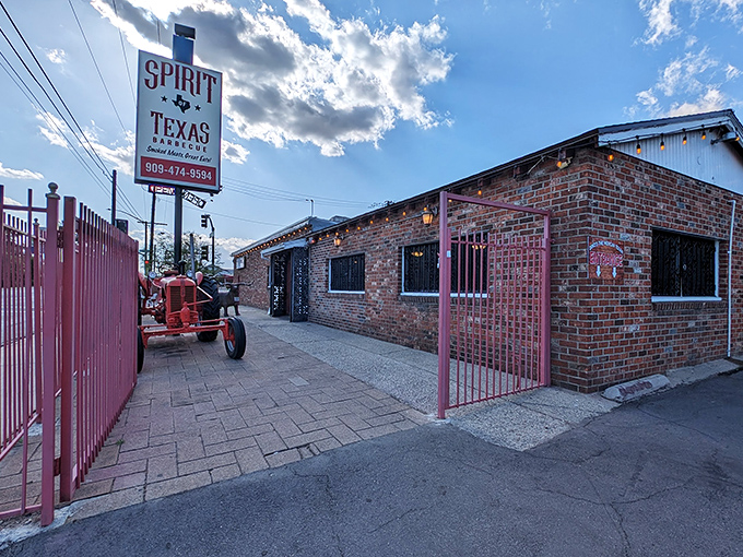 That red brick exterior and welcoming sign promise serious barbecue magic waiting inside this San Bernardino gem.