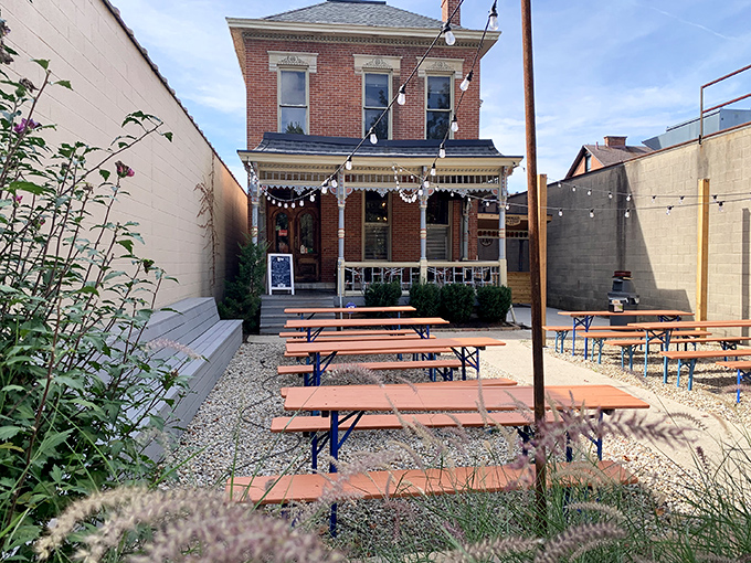 This charming brick building houses barbecue magic. String lights and picnic tables create the perfect setting for meat-induced euphoria.