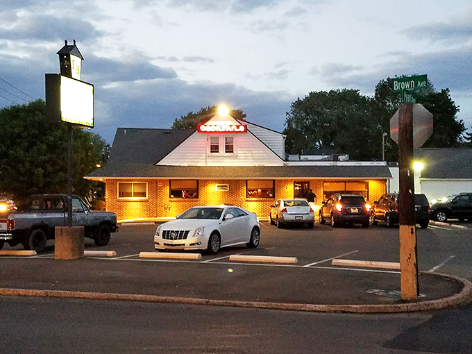 The unassuming exterior of Eddington House stands like a beacon for hungry travelers. This brick-and-siding sanctuary has been calling Bensalem locals home for dinner for generations.