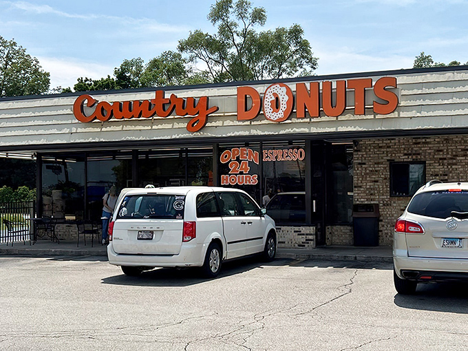 That orange signage isn't just advertising &ndash; it's a beacon calling donut lovers home to paradise.